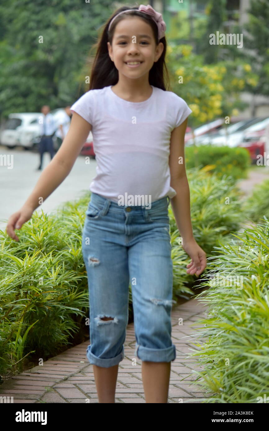Smiling Beautiful Female Walking Stock Photo - Alamy