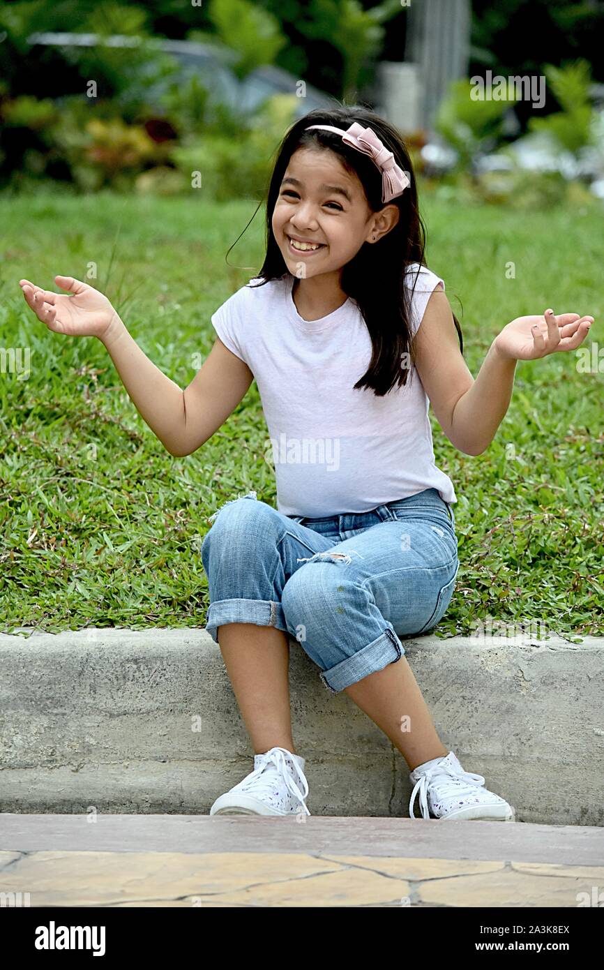 An Indecisive Beautiful Diverse Girl Stock Photo - Alamy