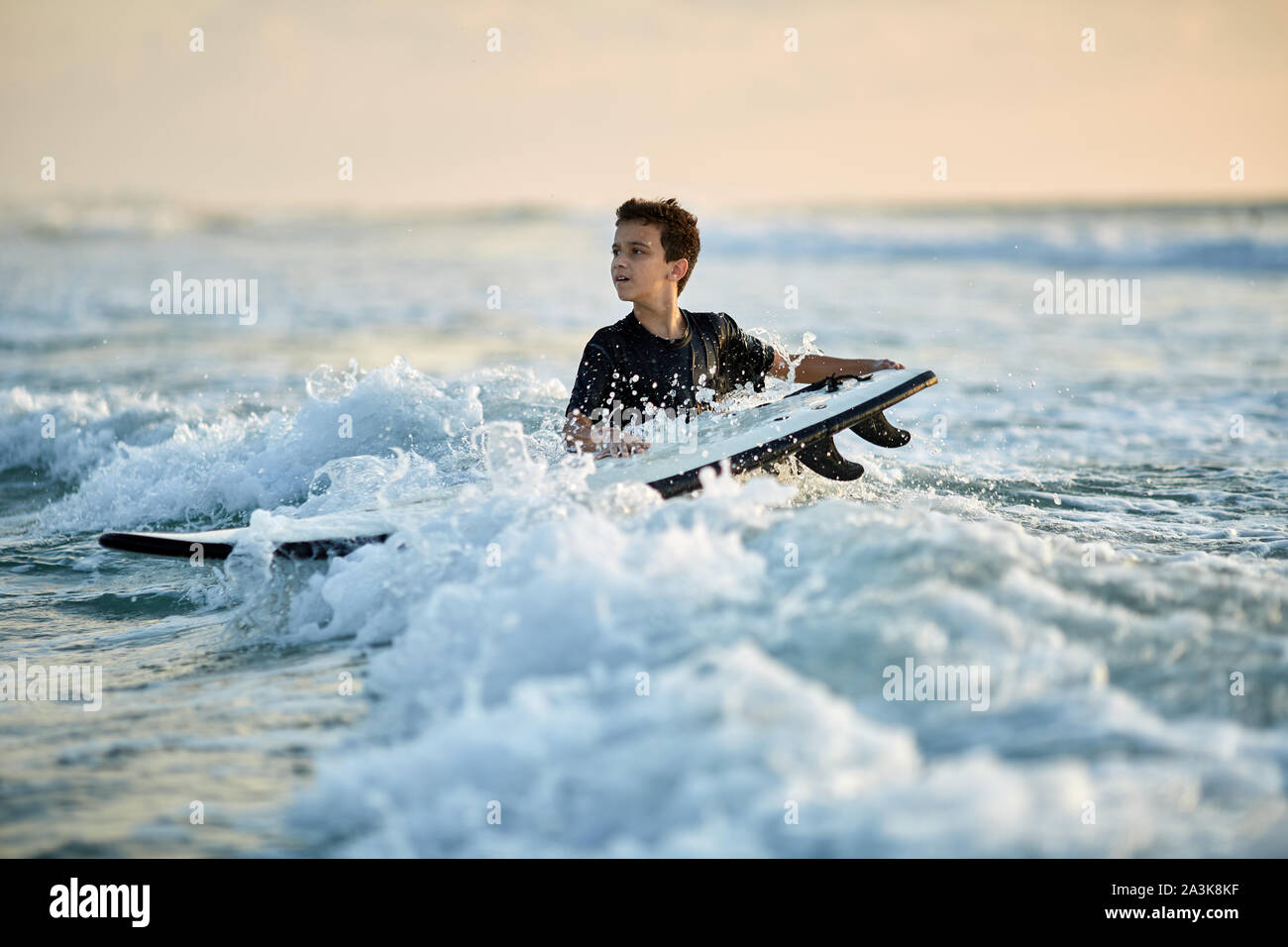 Teen Surfer Boy High Resolution Stock Photography and Images - Alamy