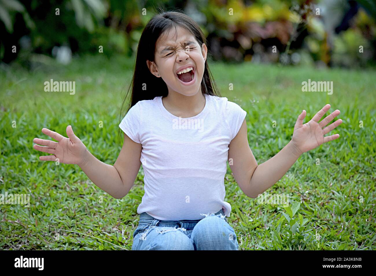 Startled Petite Female Stock Photo - Alamy