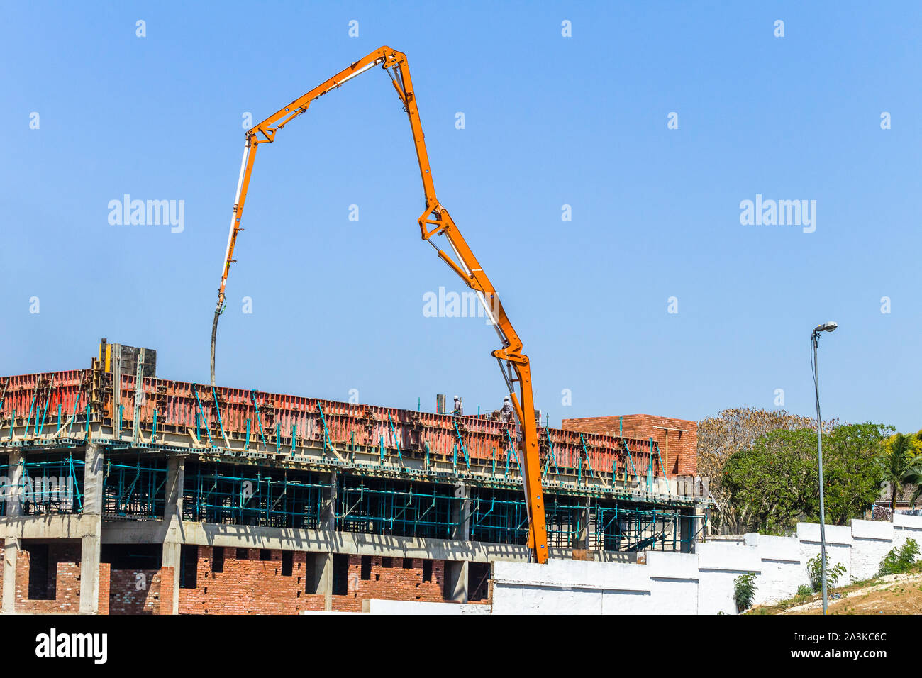 Construction building wet concrete cement pouring of floor via crane ...