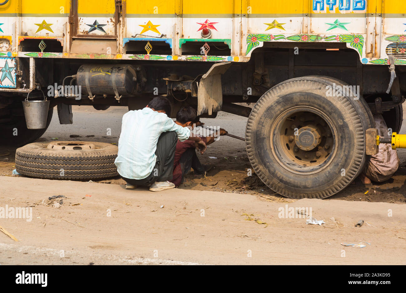 Car missing wheel hi-res stock photography and images - Alamy