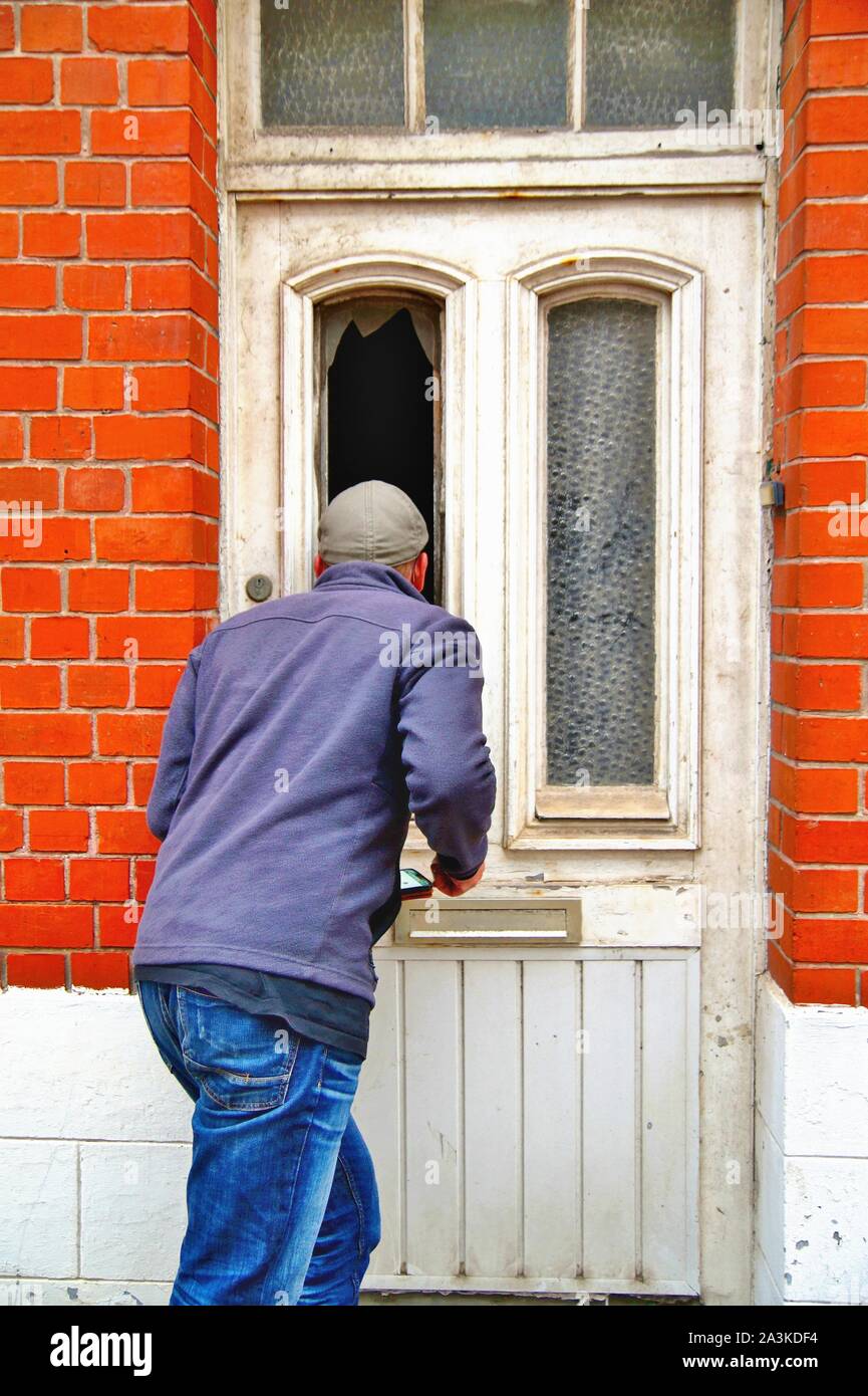 Peeking Through Door Stock Photos & Peeking Through Door Stock Images ...