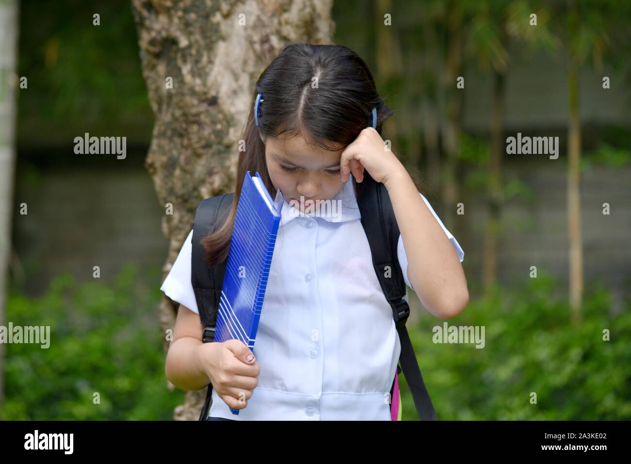 Sad Female Student Wearing Uniform Stock Photo - Alamy