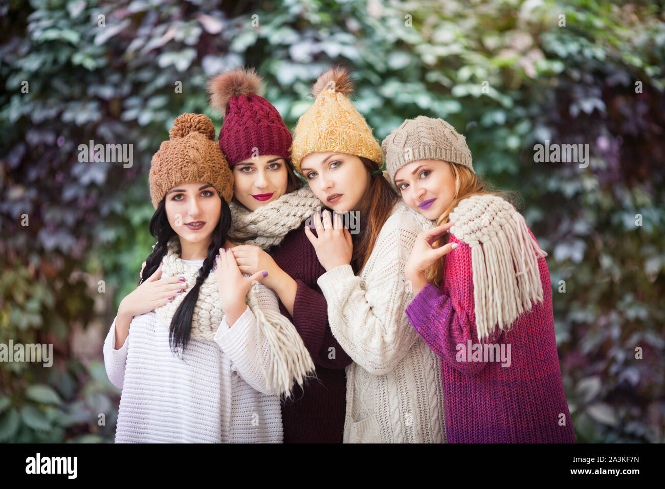 Women best friends smiling and walking at the city. Outdoors lifestyle ...