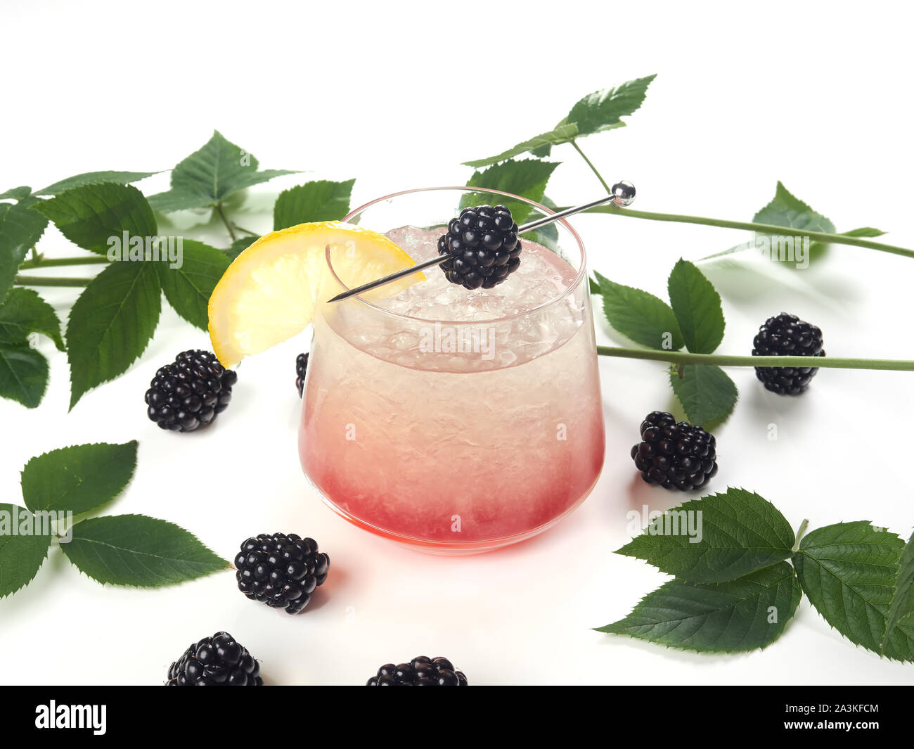 Bramble cocktail. A gin sour cocktail spiked with an eye-catching shot ...
