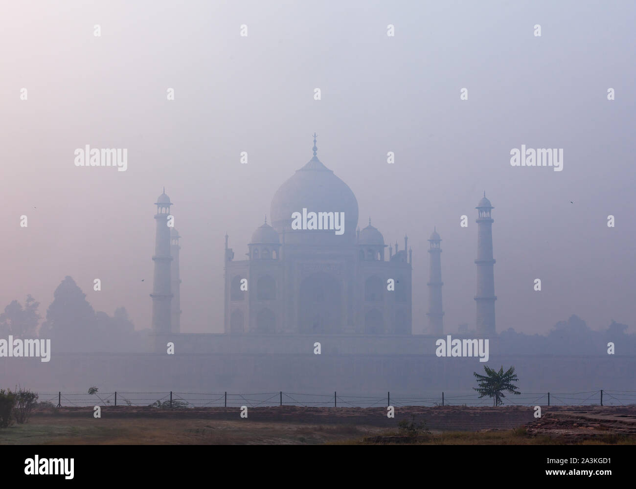 Taj mahal in mist at sunset hi-res stock photography and images - Alamy