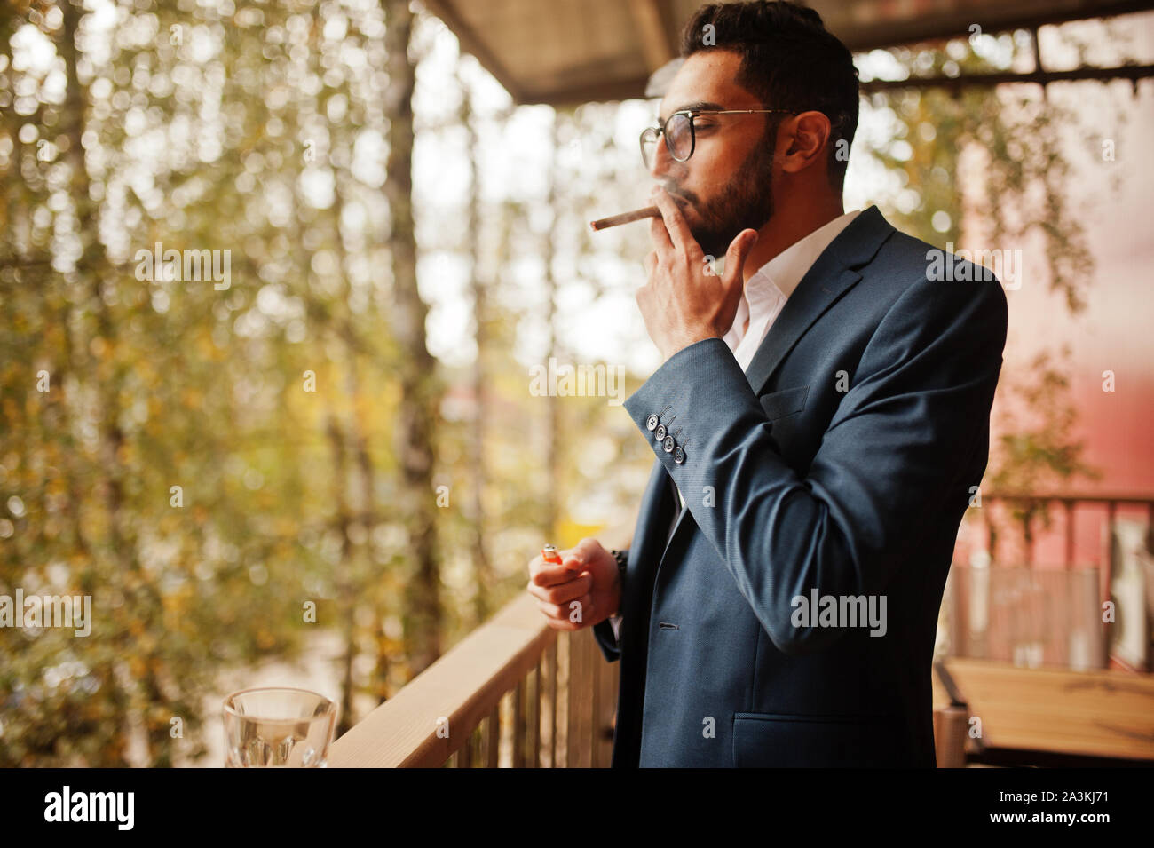 Businessman smoking pub hi-res stock photography and images - Alamy