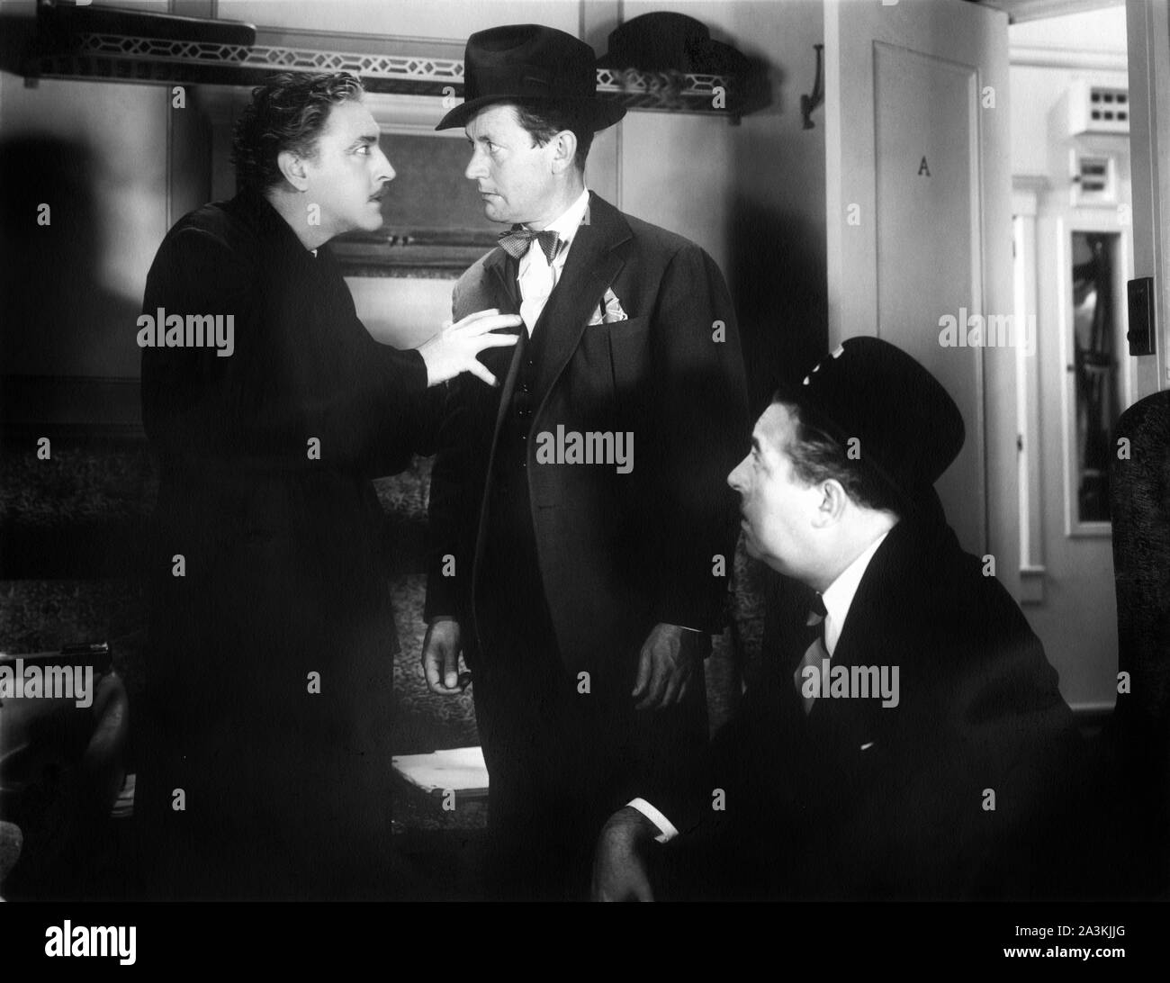JOHN BARRYMORE as Oscar Jaffe ROSCO KARNS as Owen O'Malley and WALTER ...