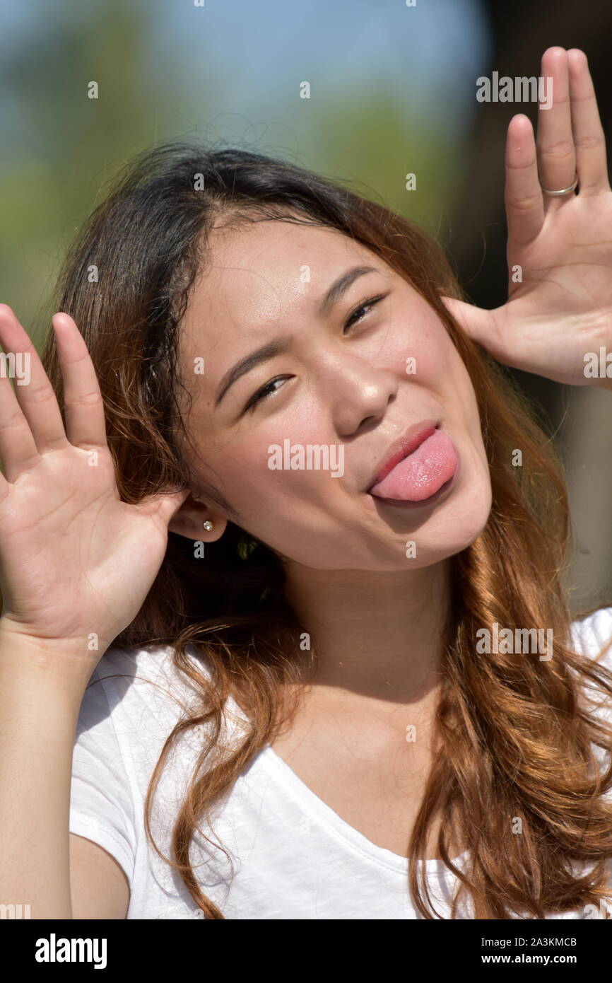 Filipina Female Making Funny Faces Stock Photo - Alamy