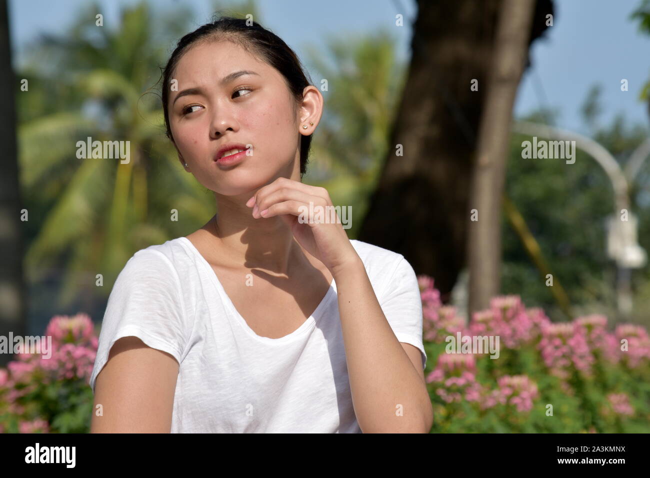 An Asian Female Thinking Stock Photo - Alamy