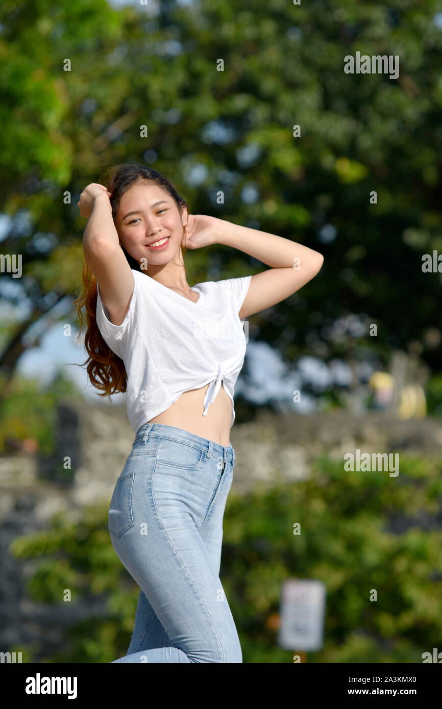 Youthful Asian Female Dancing Stock Photo - Alamy