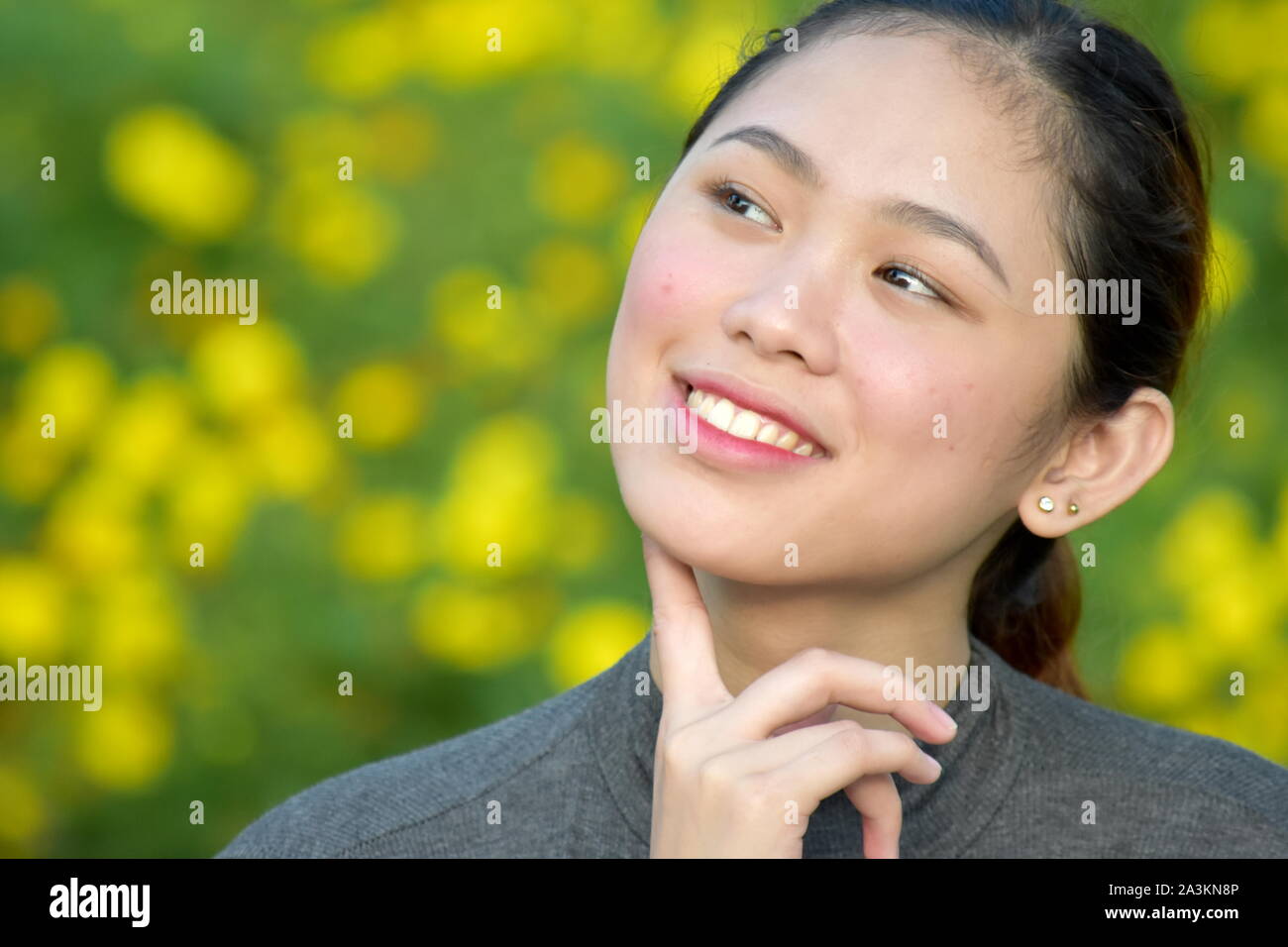 Thoughtful Young Filipina Person Stock Photo - Alamy