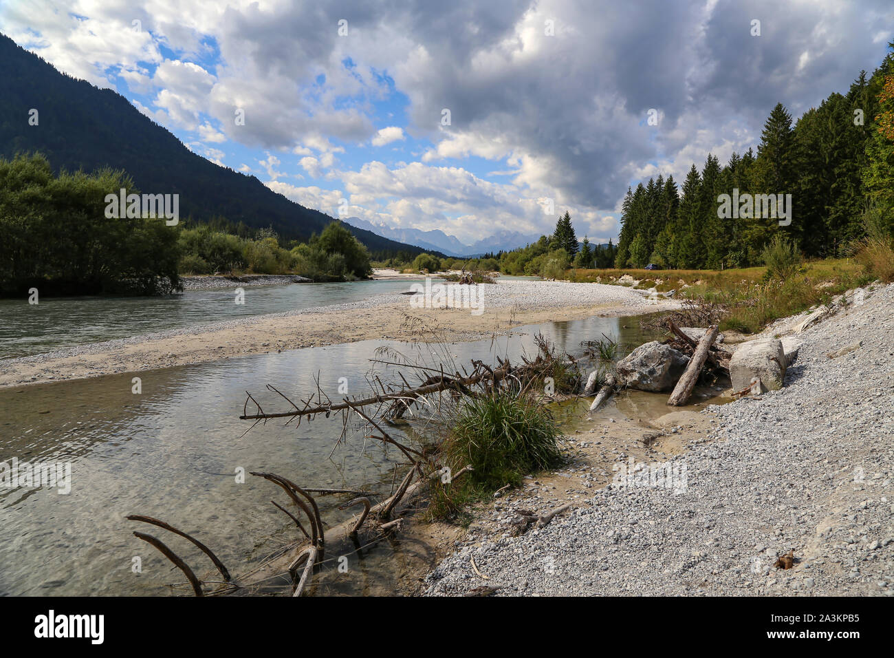Mountain landscape with a small river in the Alps Stock Photo - Alamy