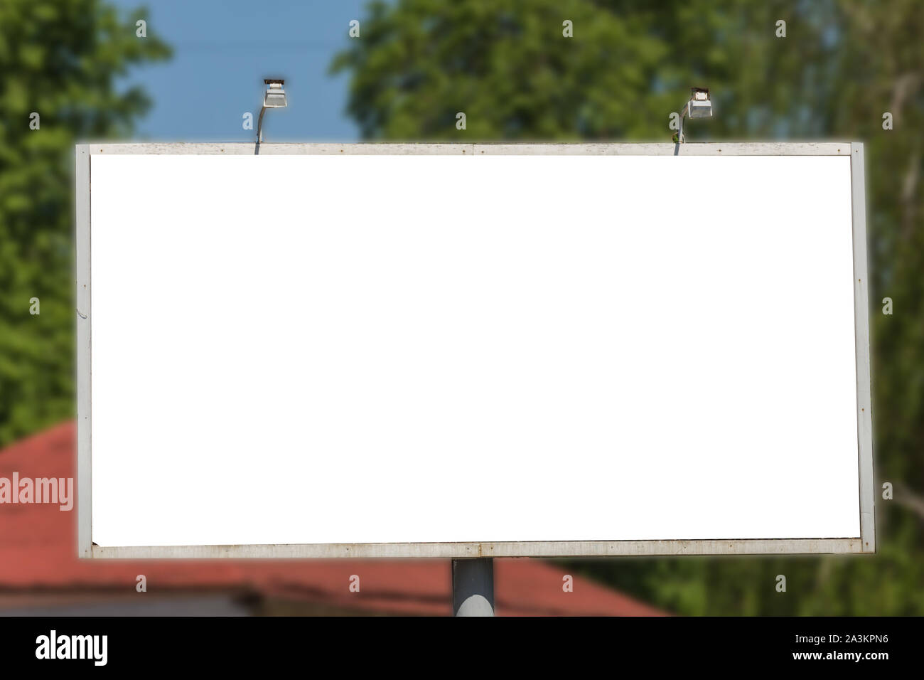 Blank advertisement board on the street of the city. Mockup for design ...