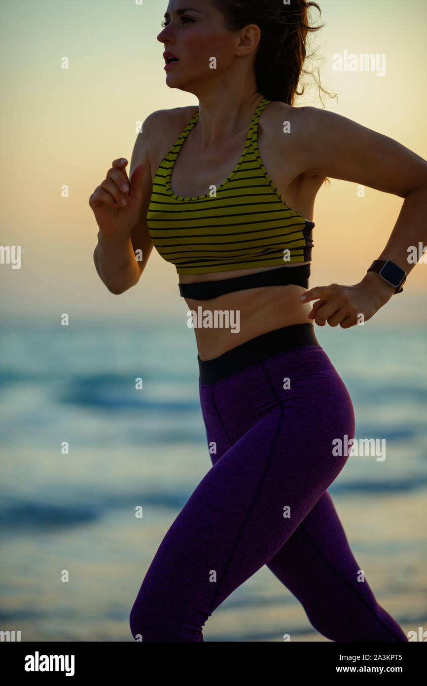 Running on beach night hi-res stock photography and images - Alamy