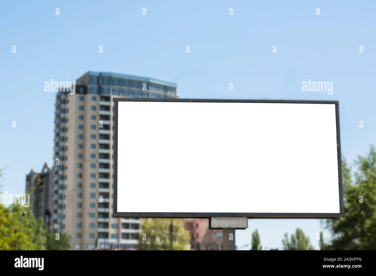 Blank advertisement board on the street of the city. Mockup for design ...