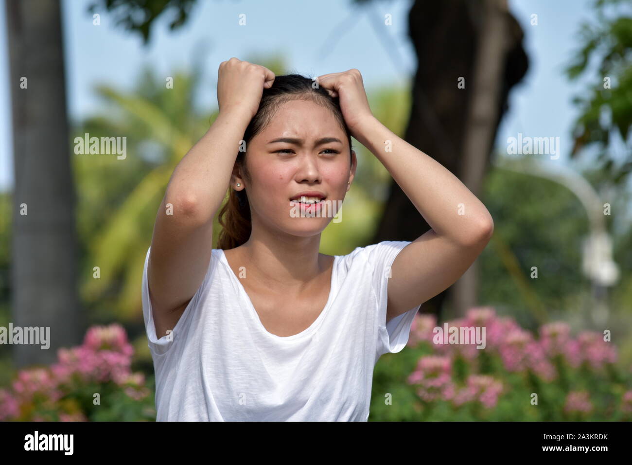 Beautiful Filipina Female Under Stress Stock Photo - Alamy