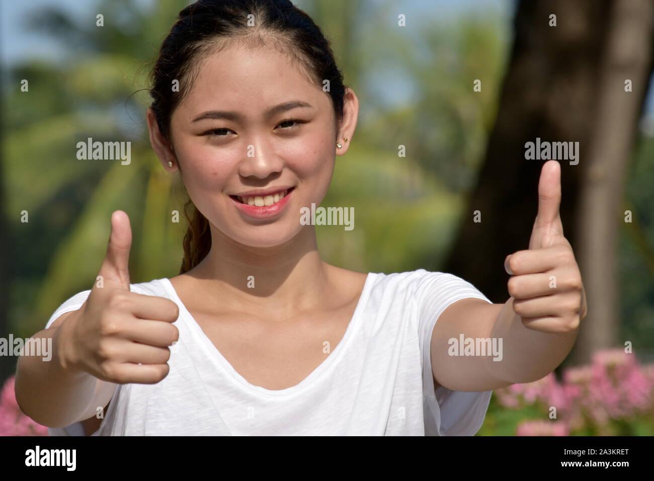 Diverse Woman With Thumbs Up Stock Photo - Alamy