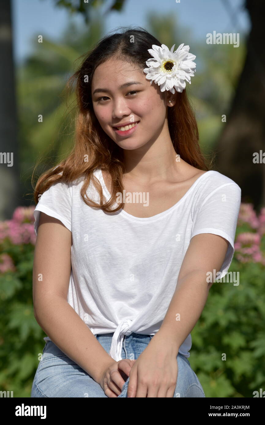 Attractive Asian Adult Female And Happiness With A Daisy Stock Photo ...
