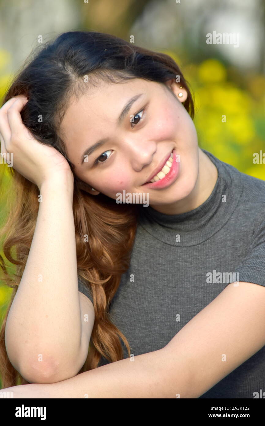 Young Asian Female Wondering Stock Photo - Alamy