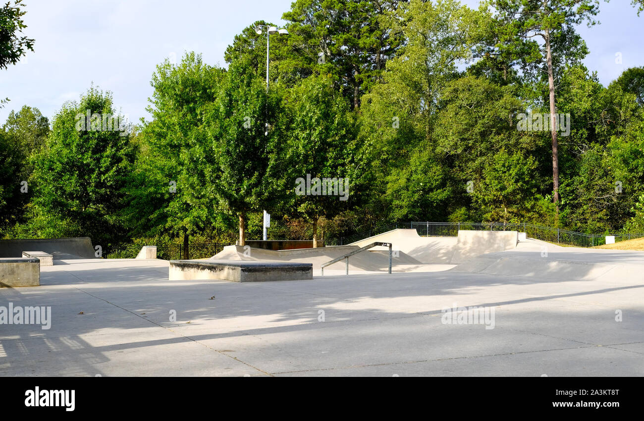 Ramps on a Concrete Skate Park under Summer Trees Stock Photo - Alamy