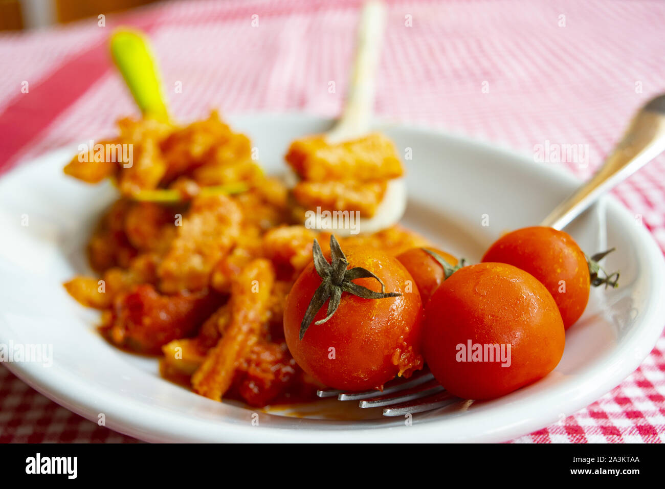 trippa alla romana or roman style tripe with fresh tomatoes and ...