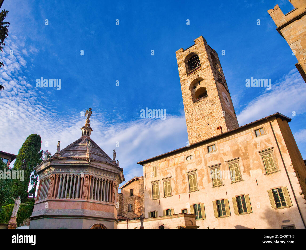View of the Battistero and campanone tower from the square of Father ...