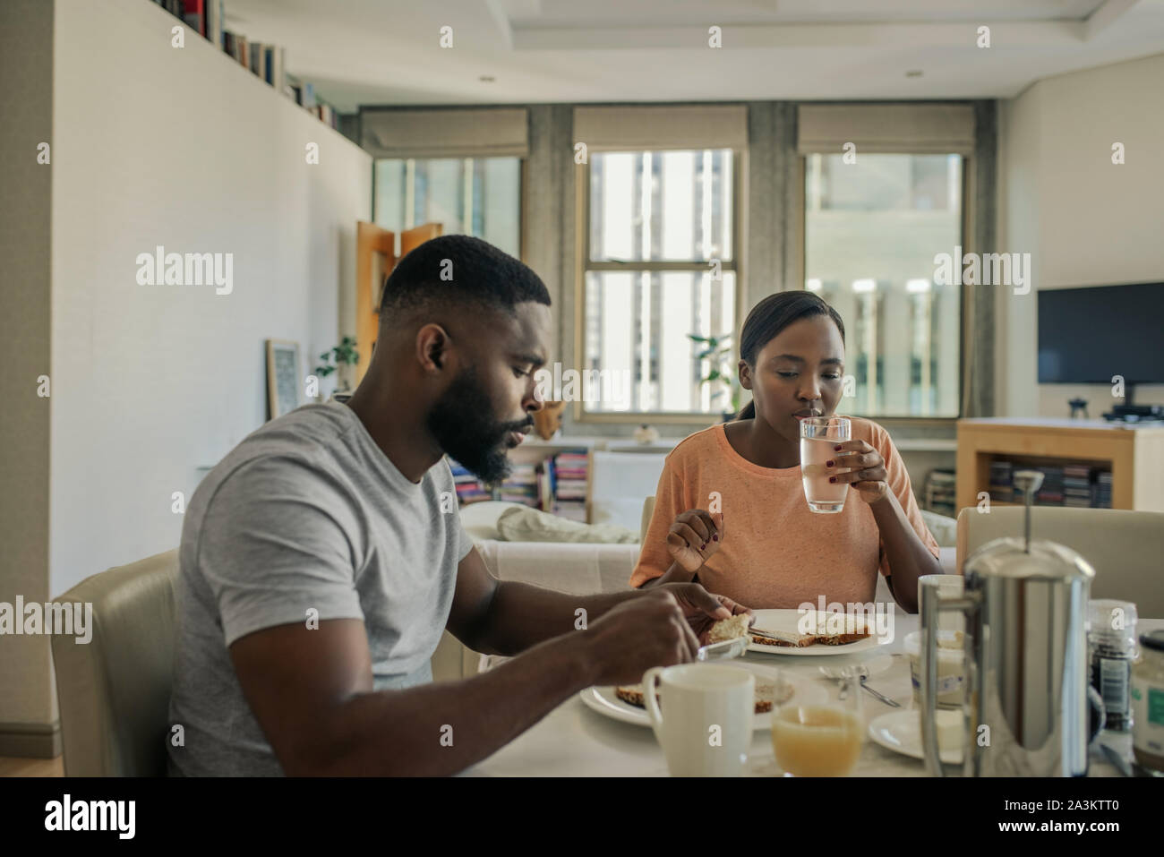 African woman eating breakfast in hi-res stock photography and images ...