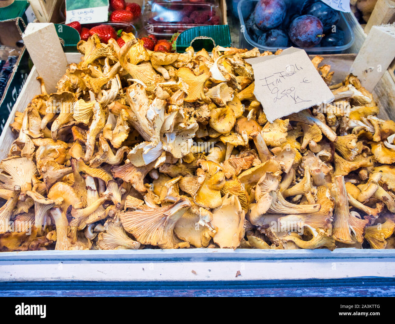 Mushrooms for sale by weight at the counter of a market stall in ...