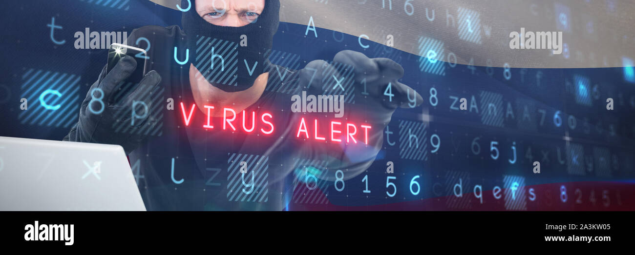 Composite image of hacker reaching out to camera Stock Photo - Alamy