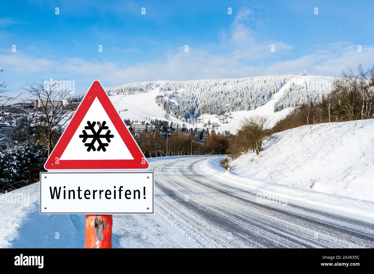 Attention winter tire sign Stock Photo - Alamy