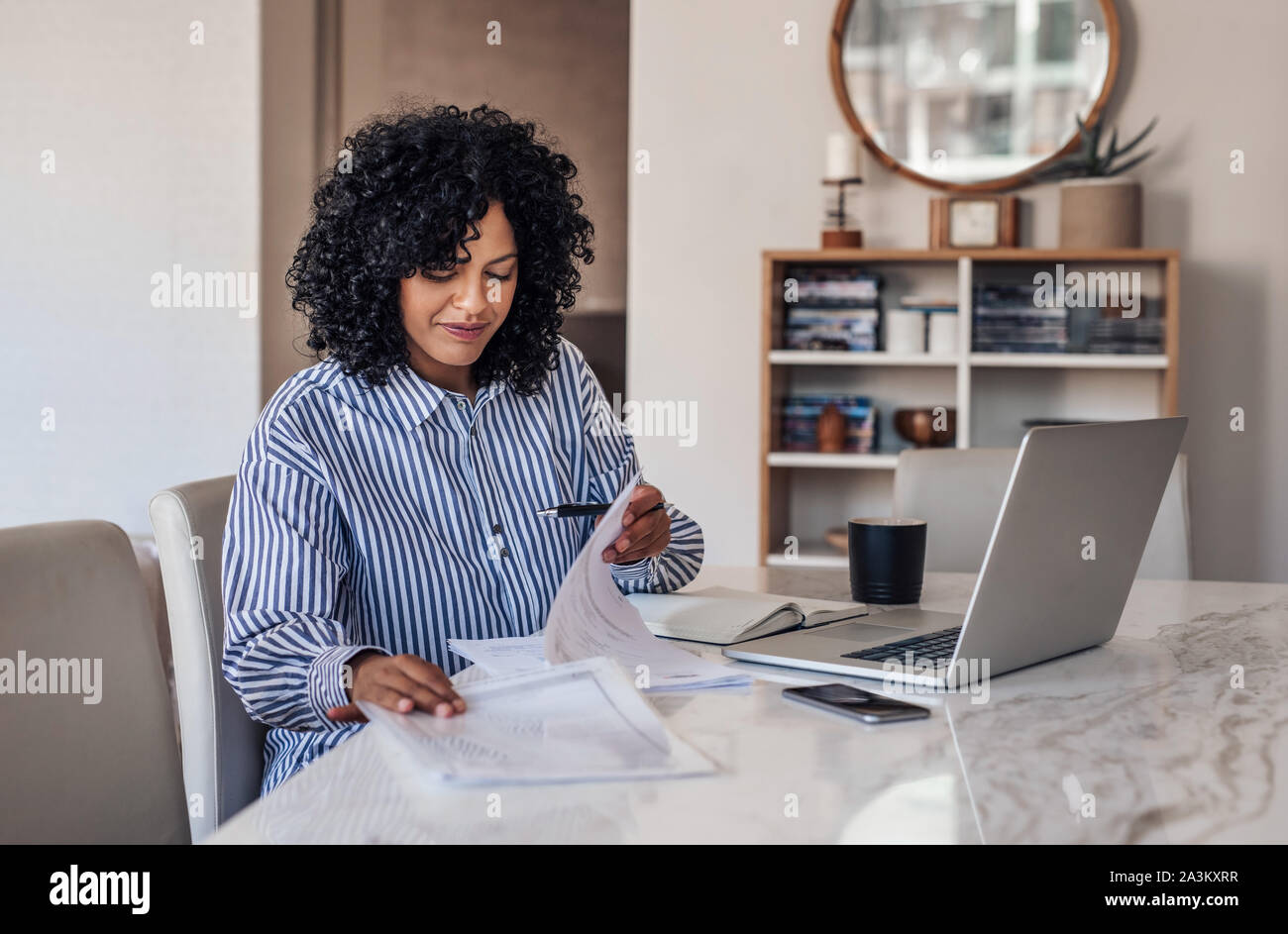 Going through paperwork hi-res stock photography and images - Alamy