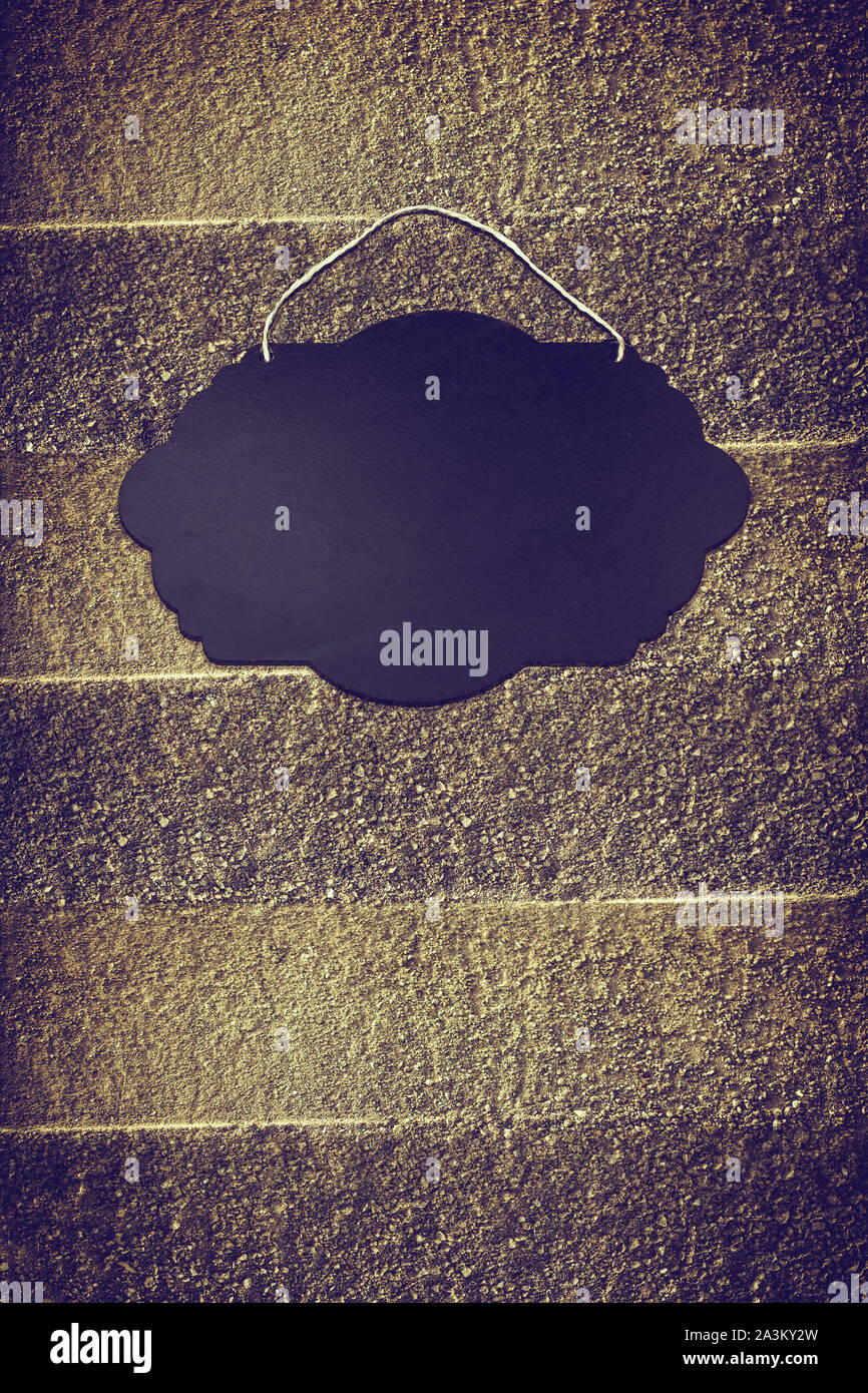 Black Empty Sign Board with string for hanging on wall Stock Photo - Alamy