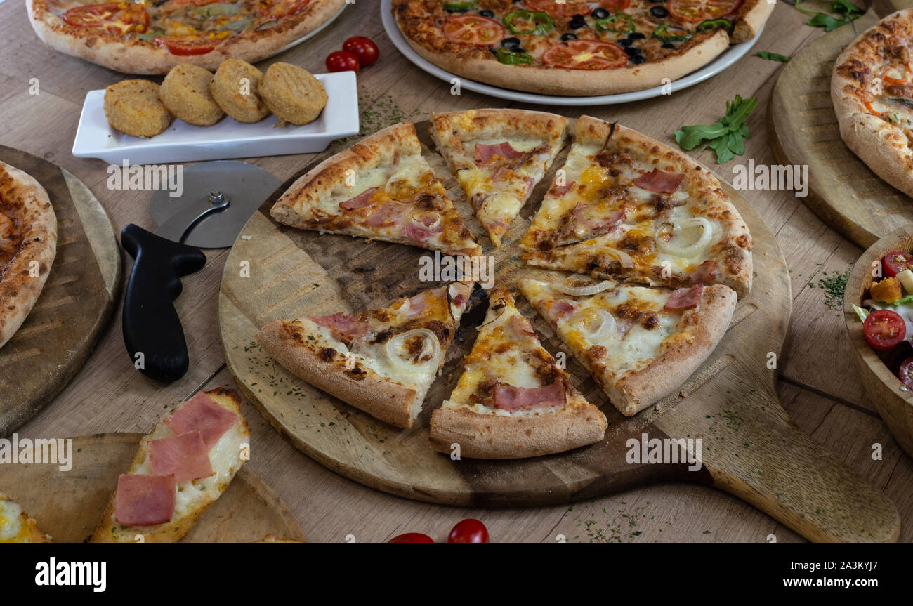 Various types of pizza for the restaurant menu hi-res stock photography ...