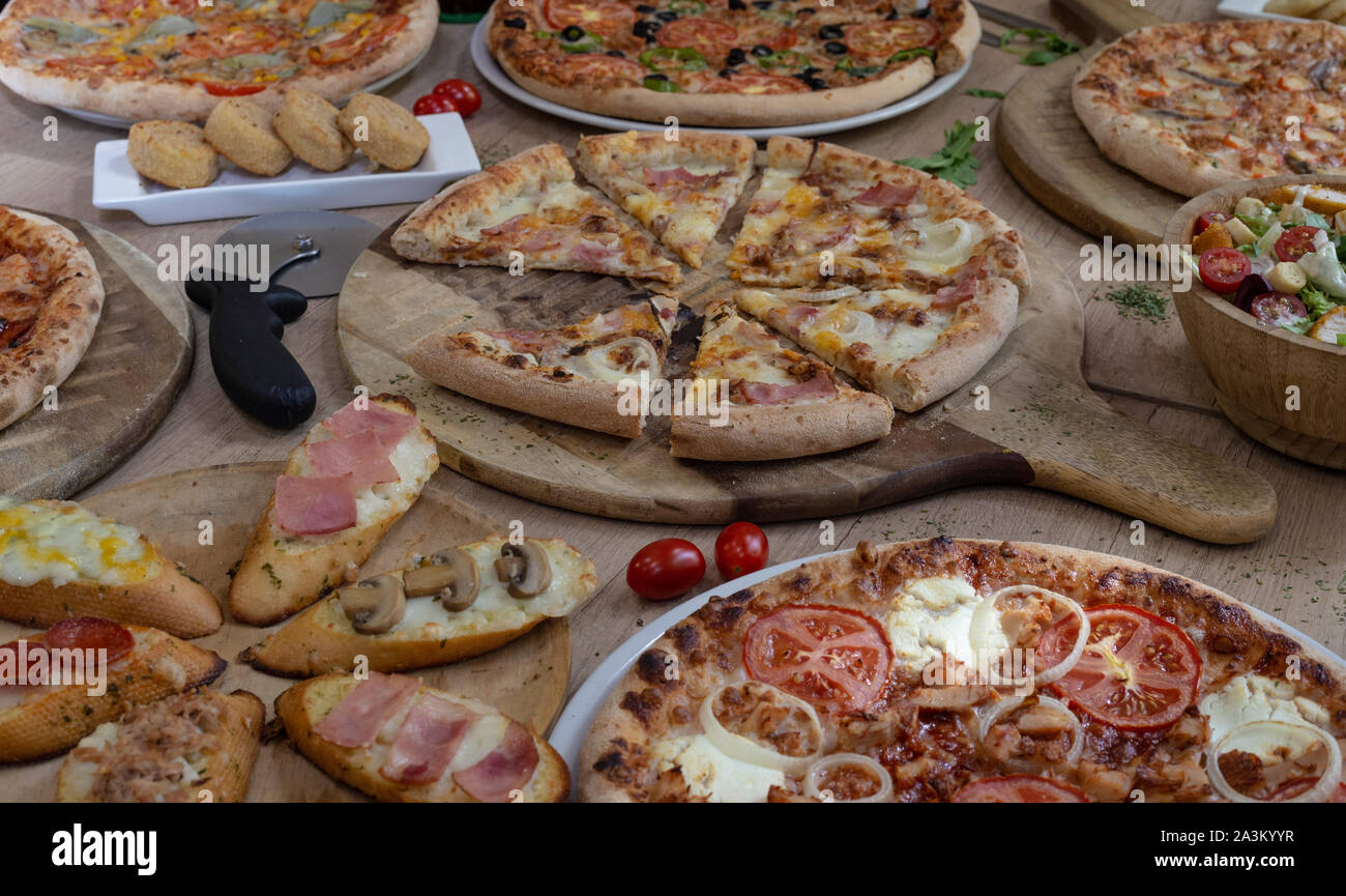 Various types of pizza for the restaurant menu hi-res stock photography ...