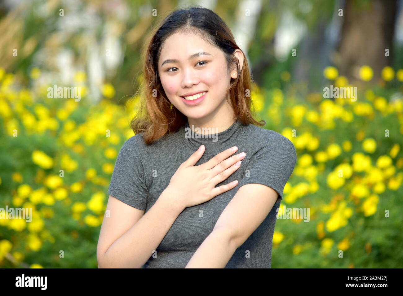 Thankful pretty young woman hi-res stock photography and images - Alamy