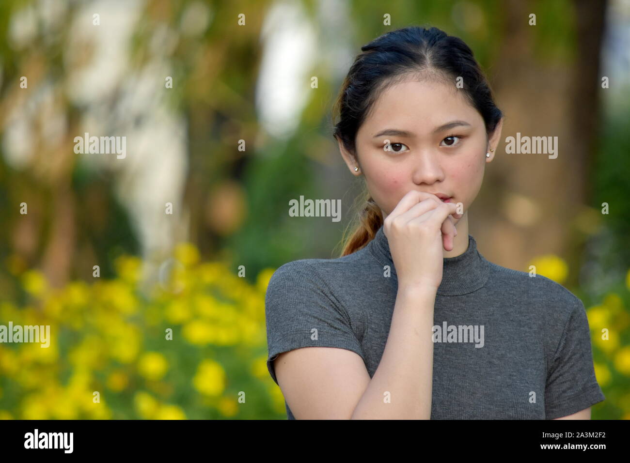 Youthful Diverse Adult Female And Worry Stock Photo - Alamy
