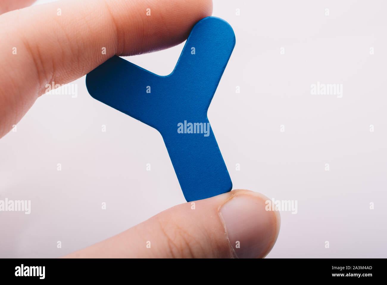 Hand holding letter cube Y of made of wood Stock Photo - Alamy