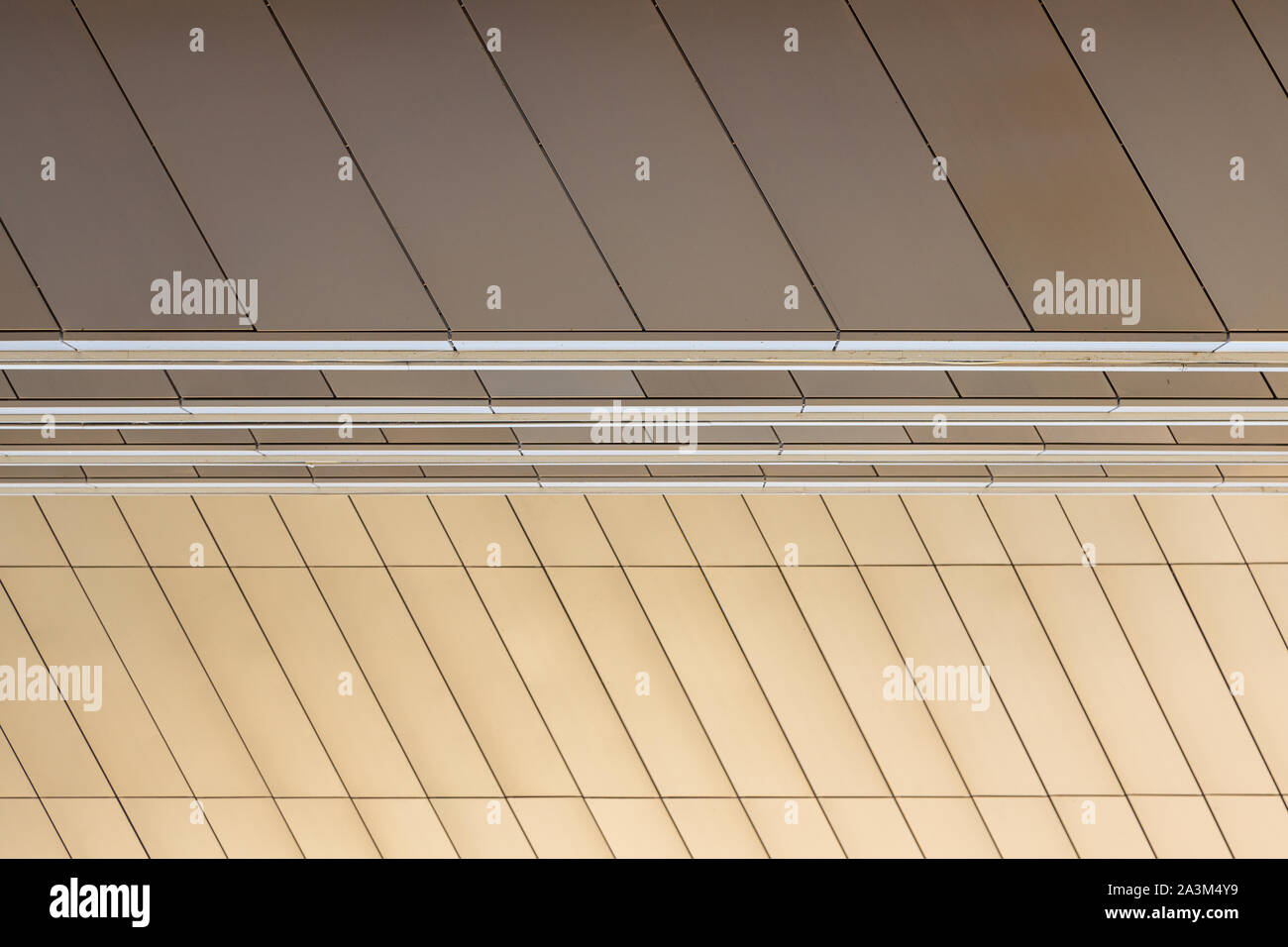 Few levels of light and pale beige smooth tiled surface Stock Photo - Alamy