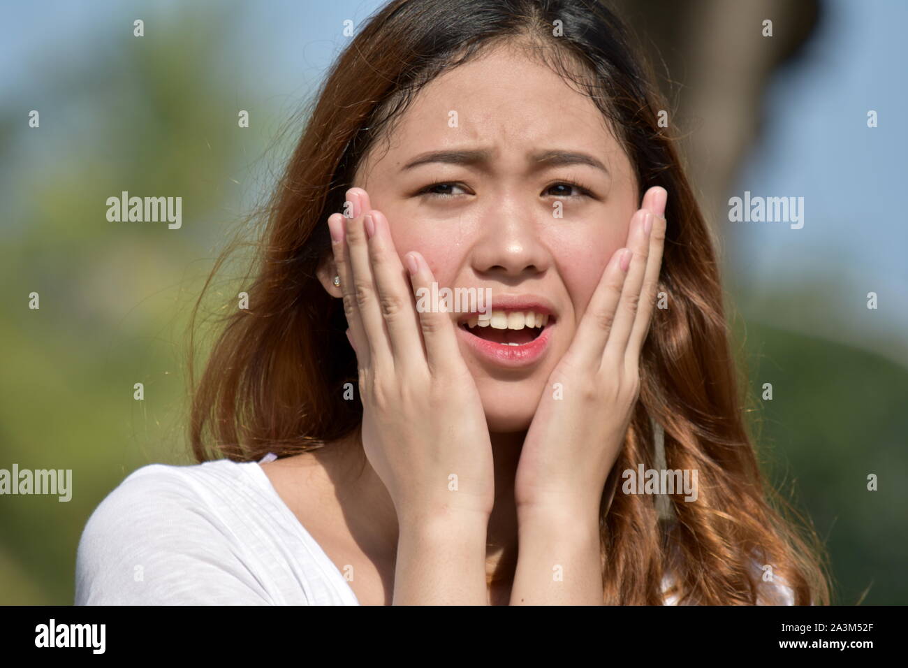 Attractive amazed shocked young hi-res stock photography and images - Alamy