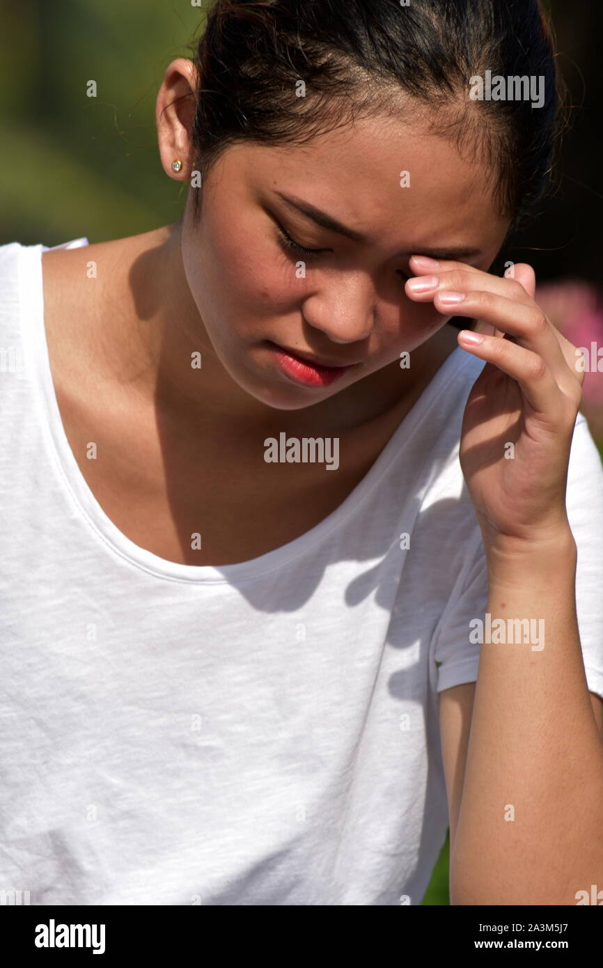 An Anxious Asian Female Woman Stock Photo - Alamy
