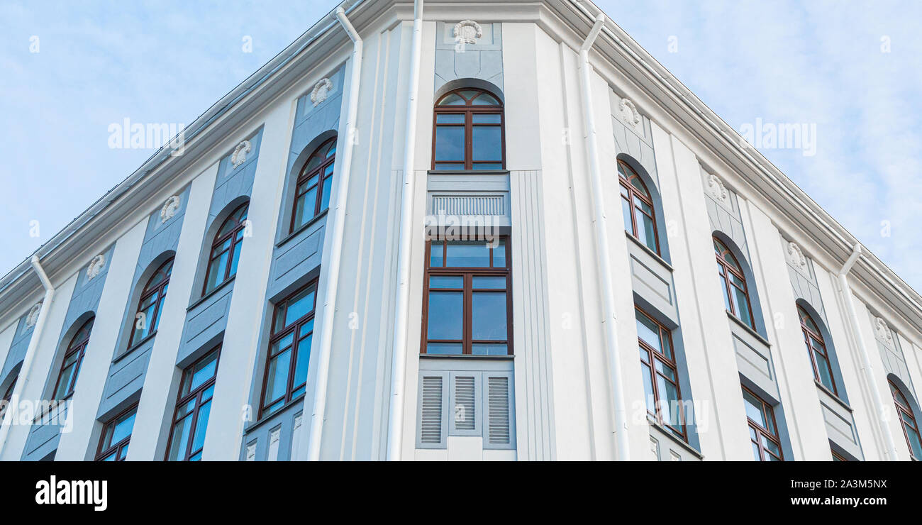 Panorama of the corner of pale building Stock Photo - Alamy