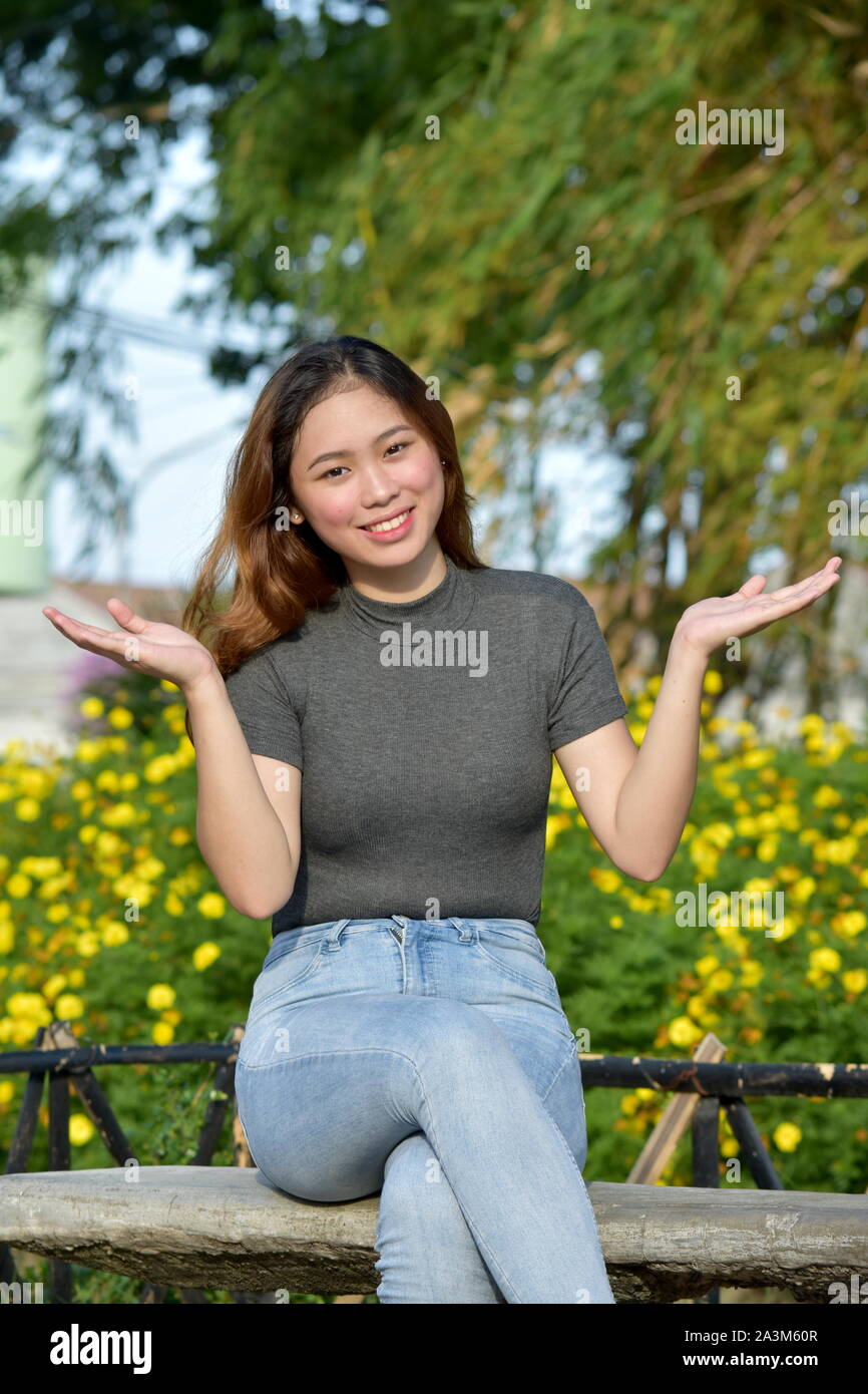 Beautiful young confused woman hi-res stock photography and images - Alamy