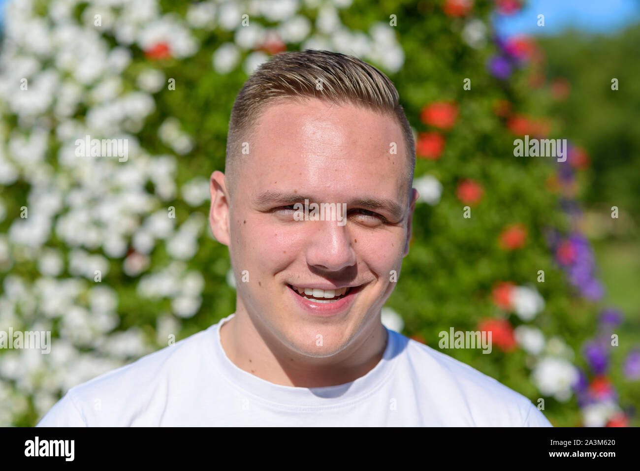 Positive friendly man beaming s hi-res stock photography and images - Alamy