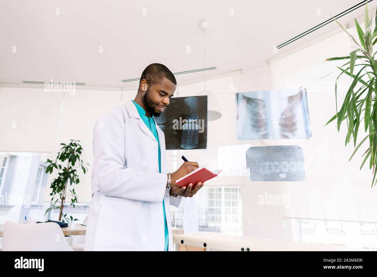 Medicine, oncology, tumour. Professional African male oncologist ...