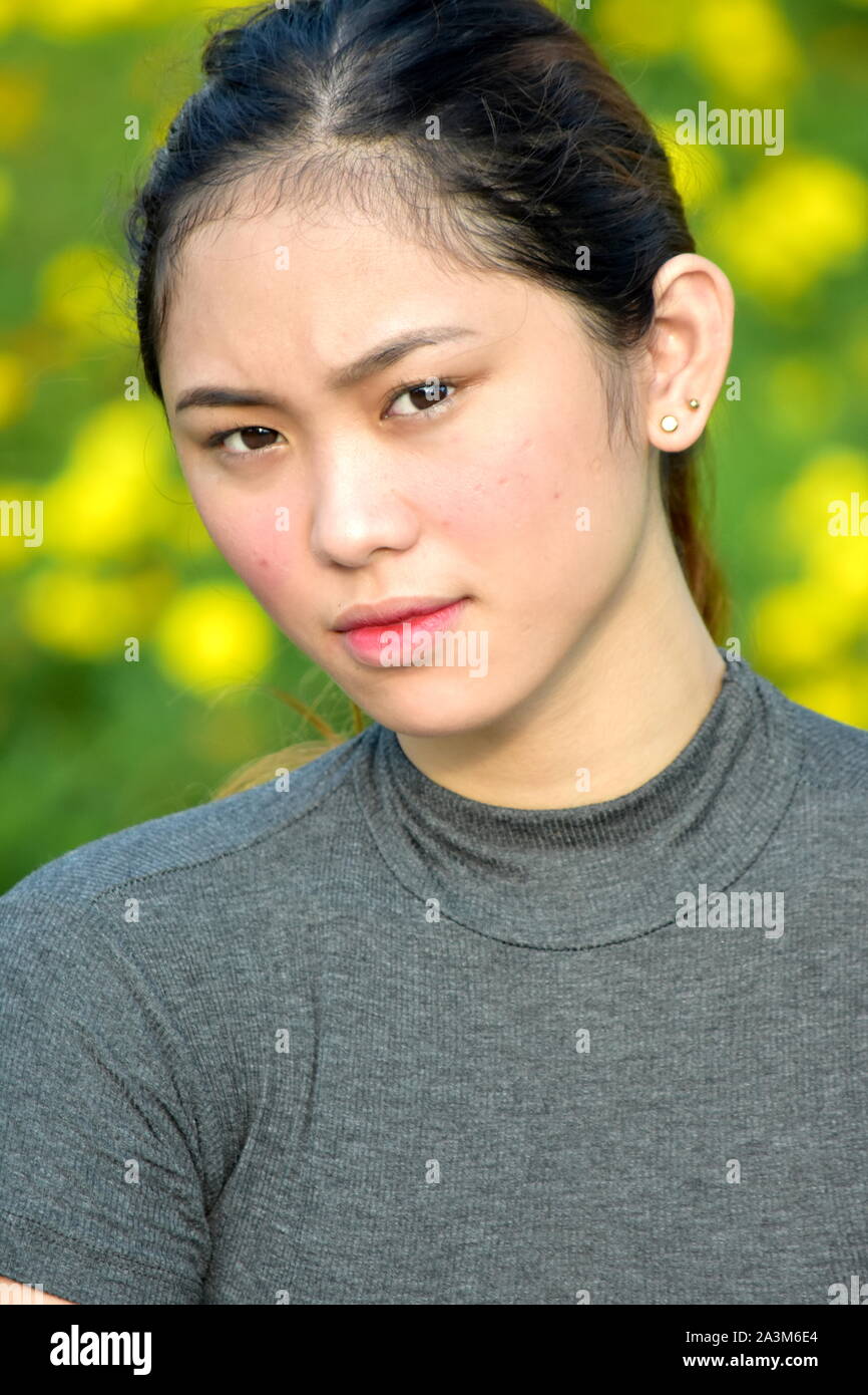 Serious youthful asian person hi-res stock photography and images - Alamy