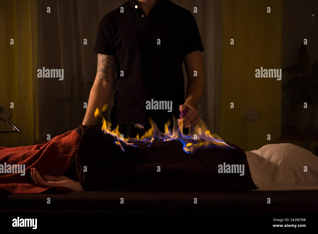 Chinese fire massage and therapy Stock Photo - Alamy