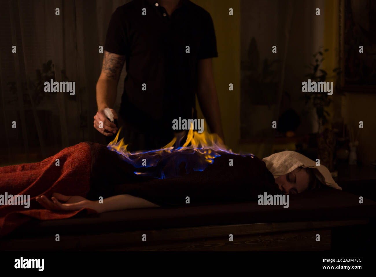 Chinese fire massage and therapy Stock Photo - Alamy