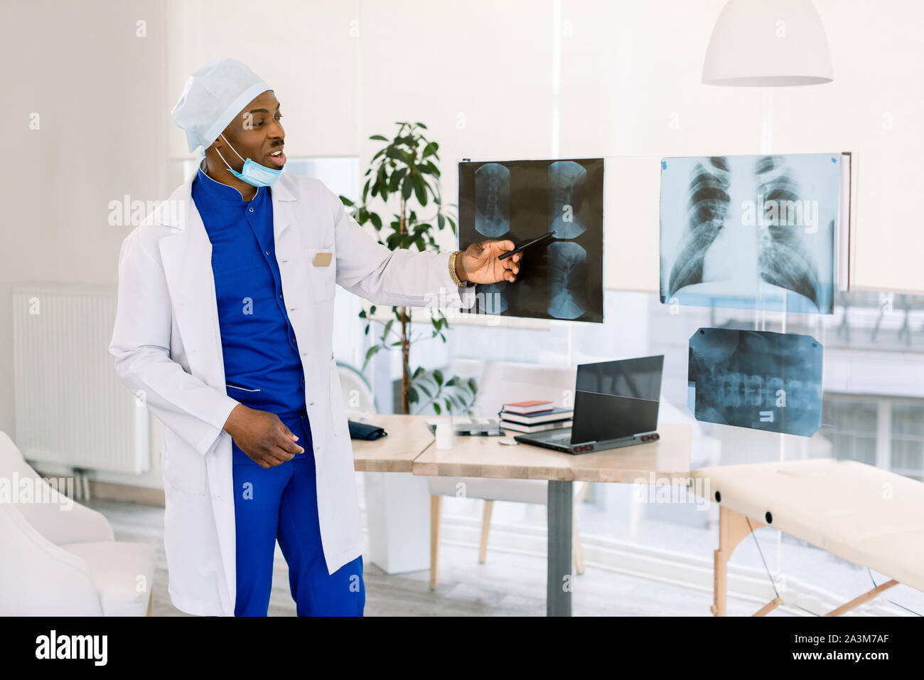radiology, people and medicine concept - young African American man ...